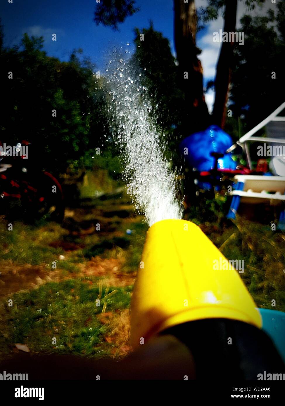 Spraying with hose hi-res stock photography and images - Alamy
