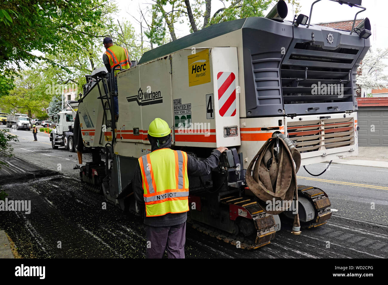 grinding street pavement in Brooklyn NYC Stock Photo - Alamy