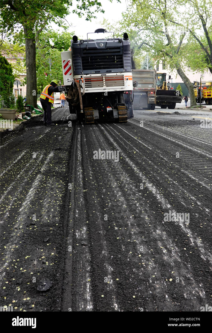 grinding street pavement in Brooklyn NYC Stock Photo - Alamy