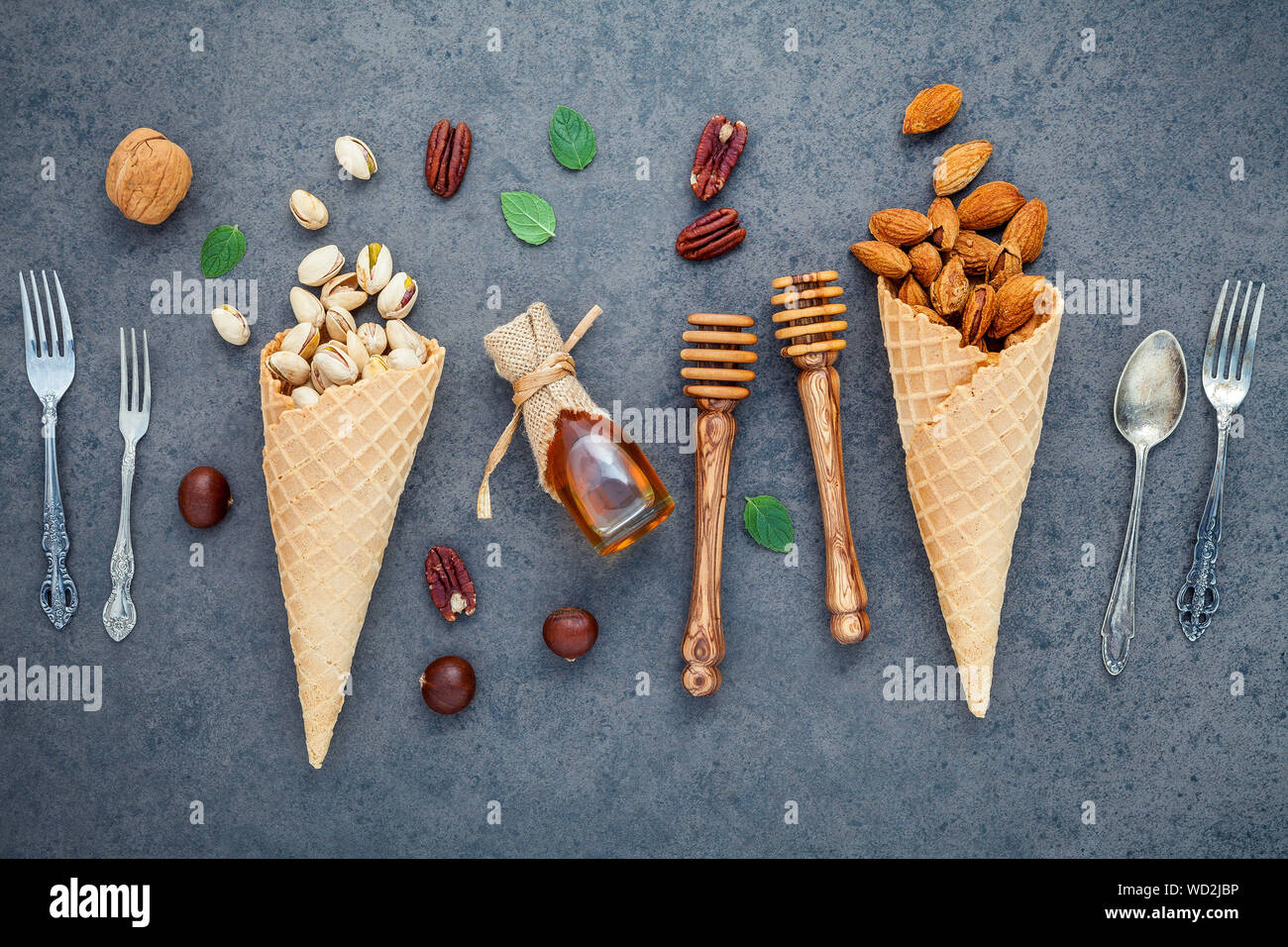 Ice cream cone with nuts hi-res stock photography and images - Alamy