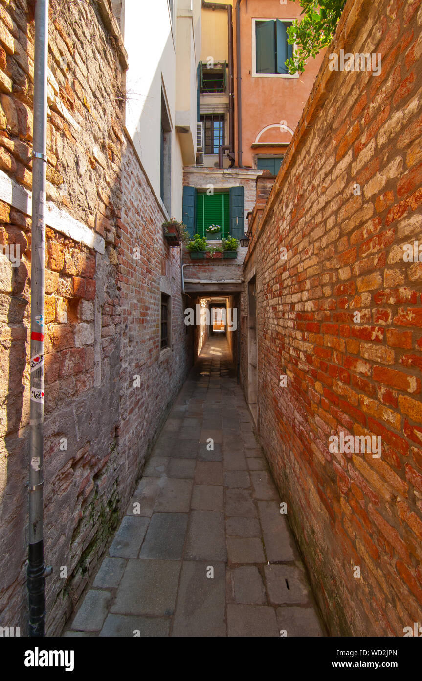 Paved alley hi-res stock photography and images - Alamy