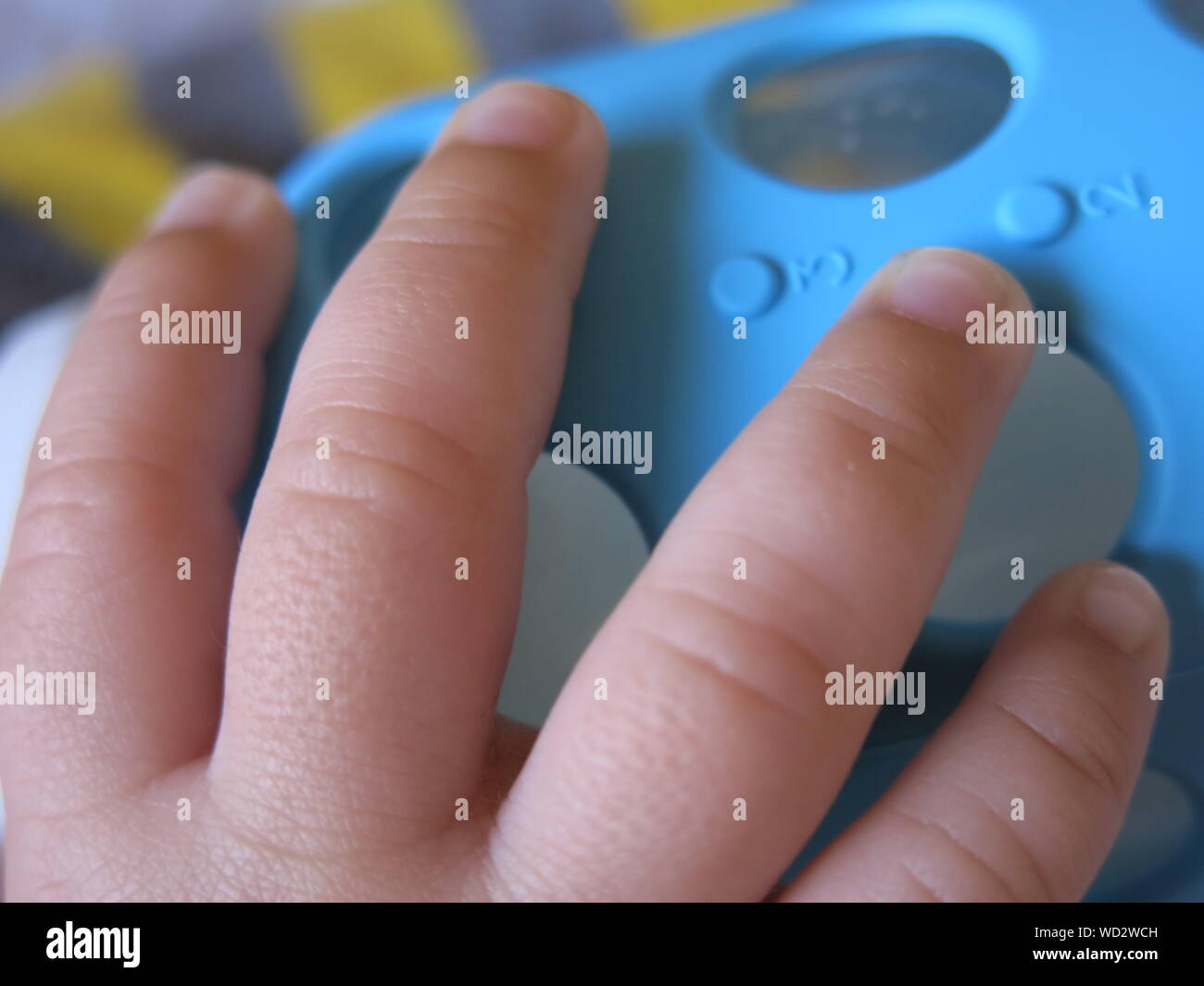 Baby with toy hi-res stock photography and images - Alamy