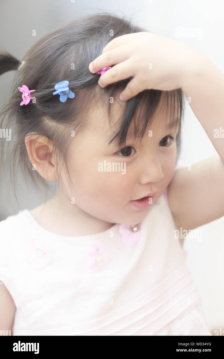 Wearing pins hi-res stock photography and images - Alamy