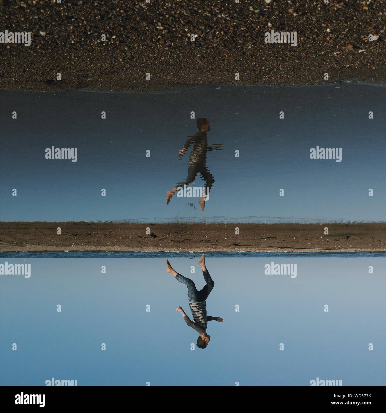 Wet man running hi-res stock photography and images - Alamy