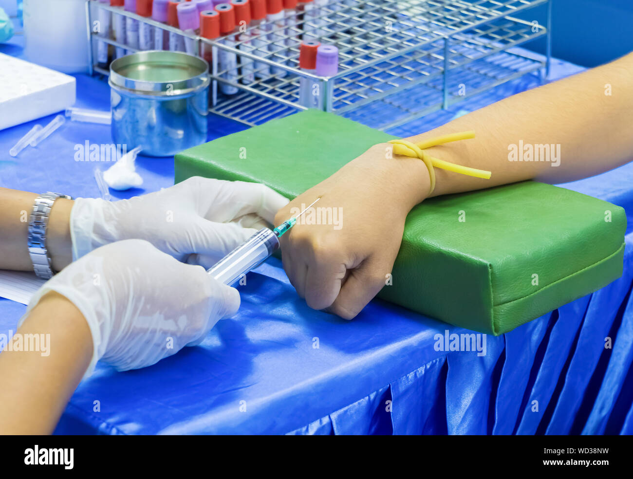 Medical selective syringe on arm patient to collect blood for test the ...
