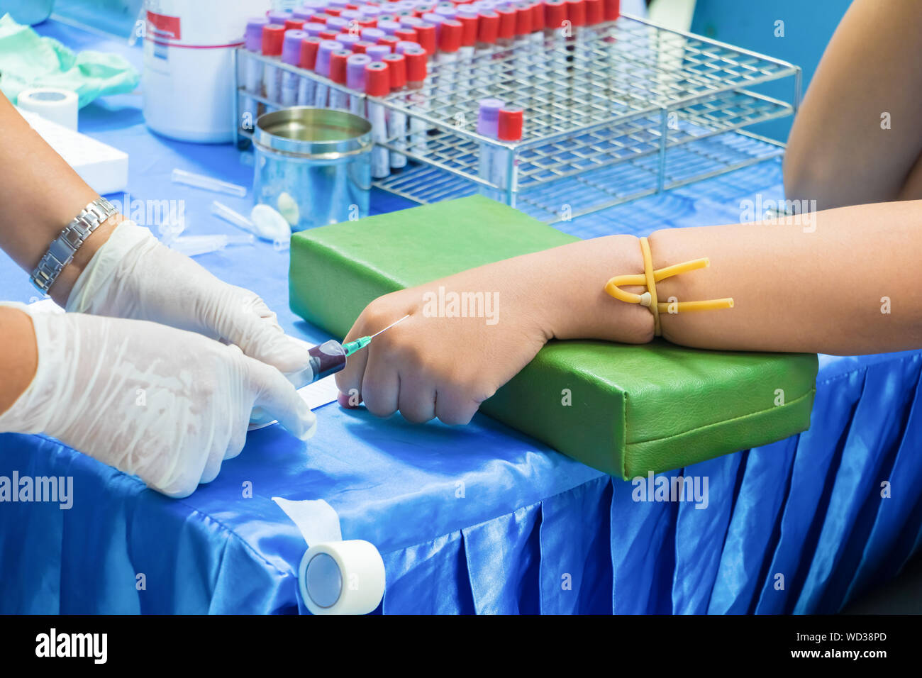 Medical selective syringe on arm patient to collect blood for test the ...