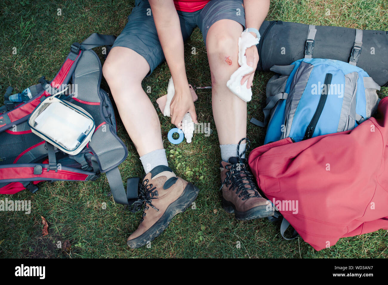 Cleaning wound on knee hi-res stock photography and images - Alamy