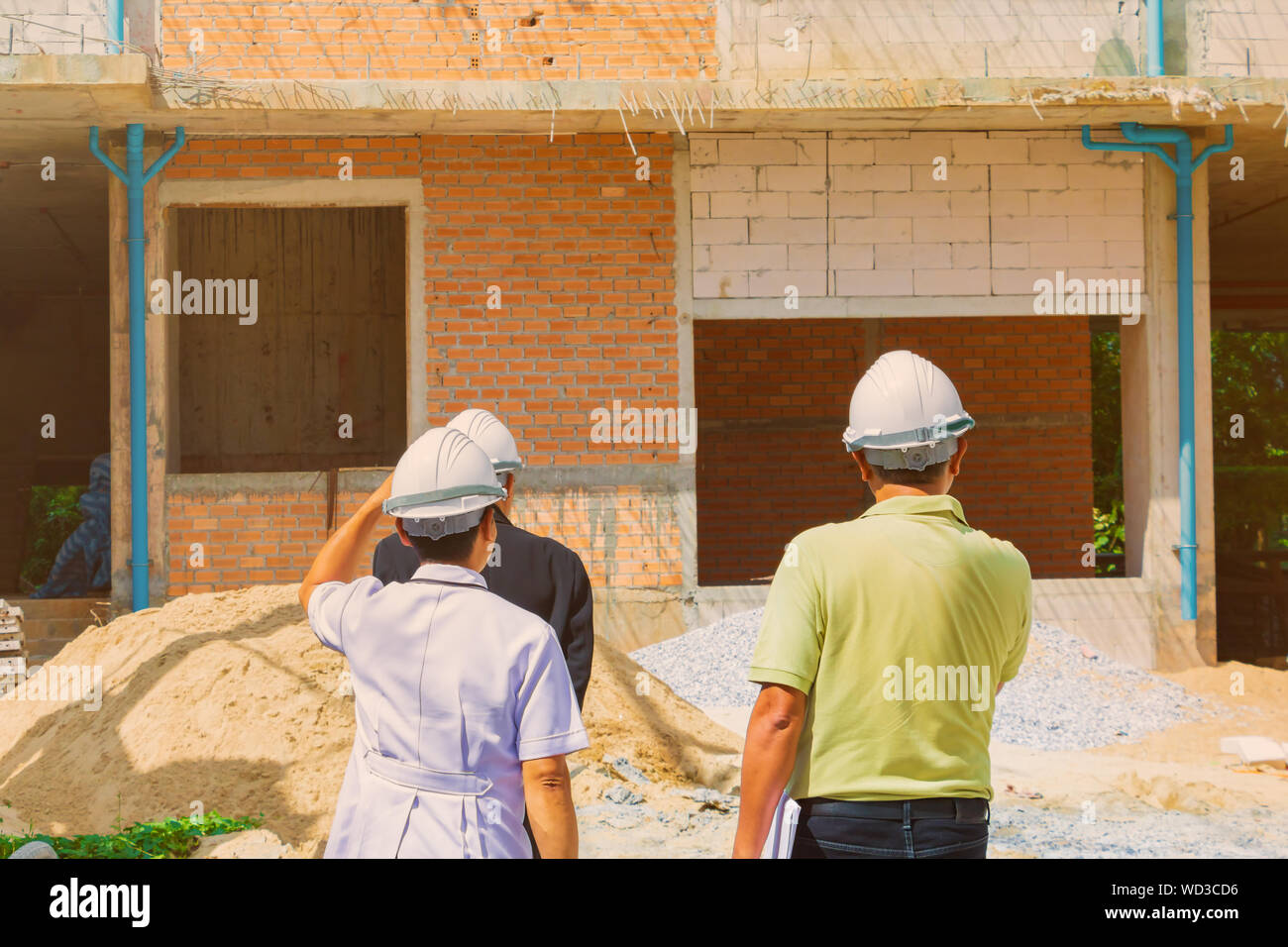 architect - engineer male three wear helmet white in check work ...