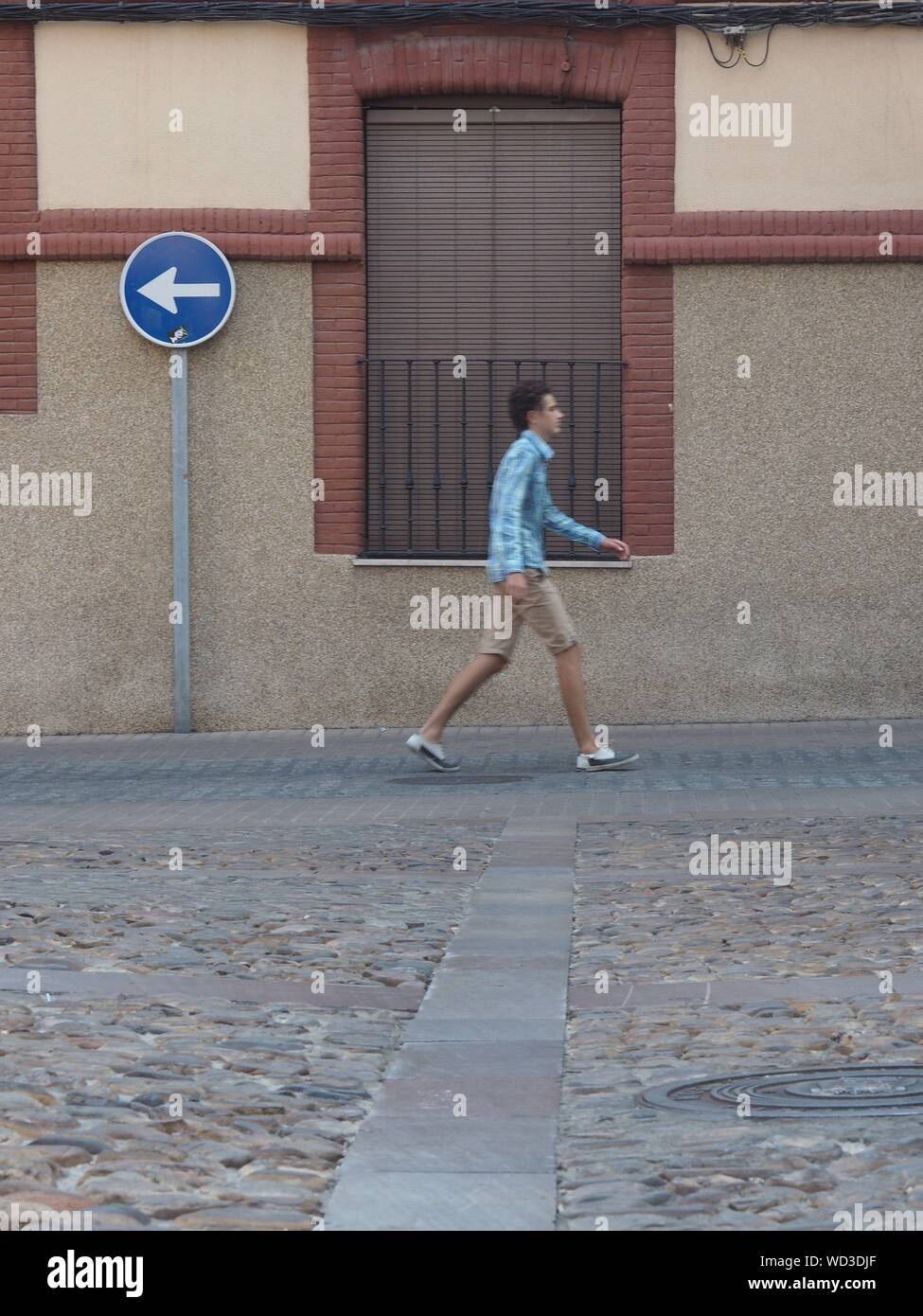 Young man walking not beach hi-res stock photography and images - Alamy