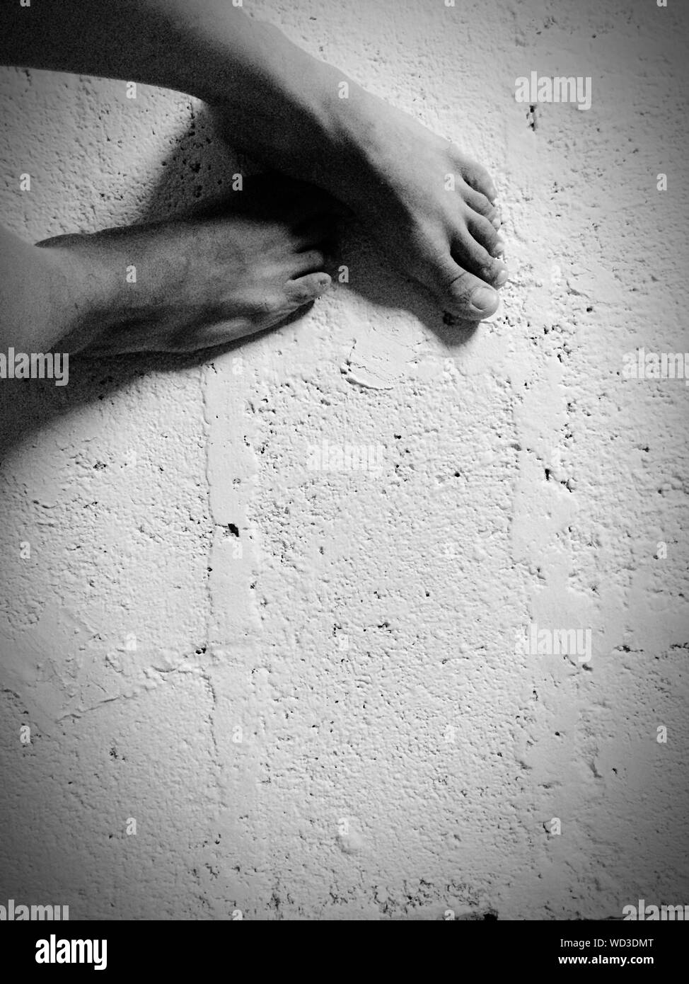 Feet On Wall Stock Photos & Feet On Wall Stock Images - Alamy