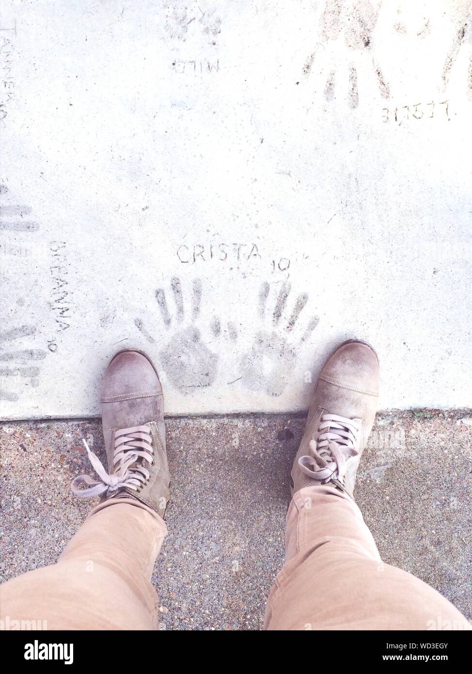 Handprints On Sidewalk Stock Photo - Alamy