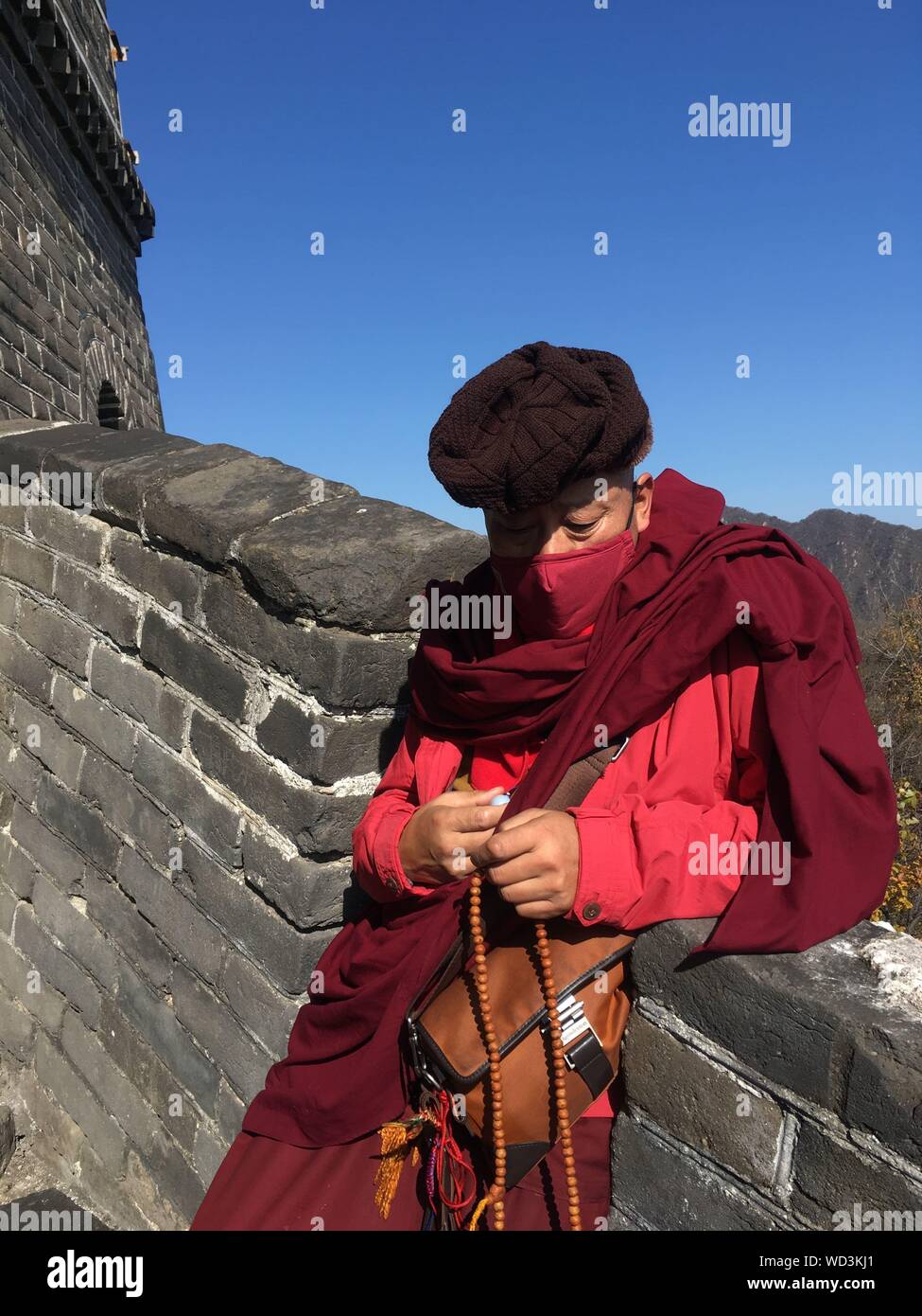 Monk holding prayer beads hi-res stock photography and images - Alamy