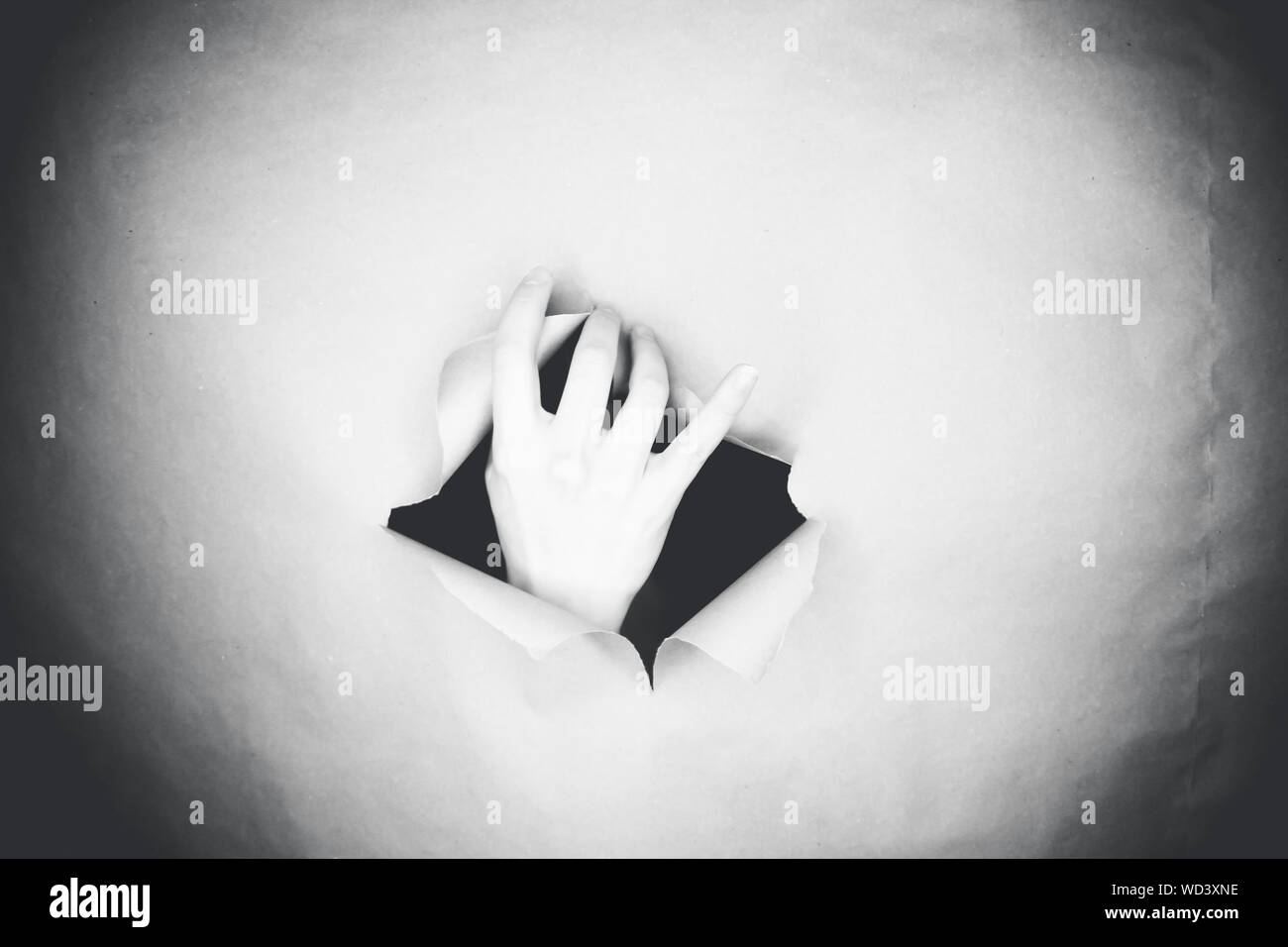 Hand tear hi-res stock photography and images - Alamy