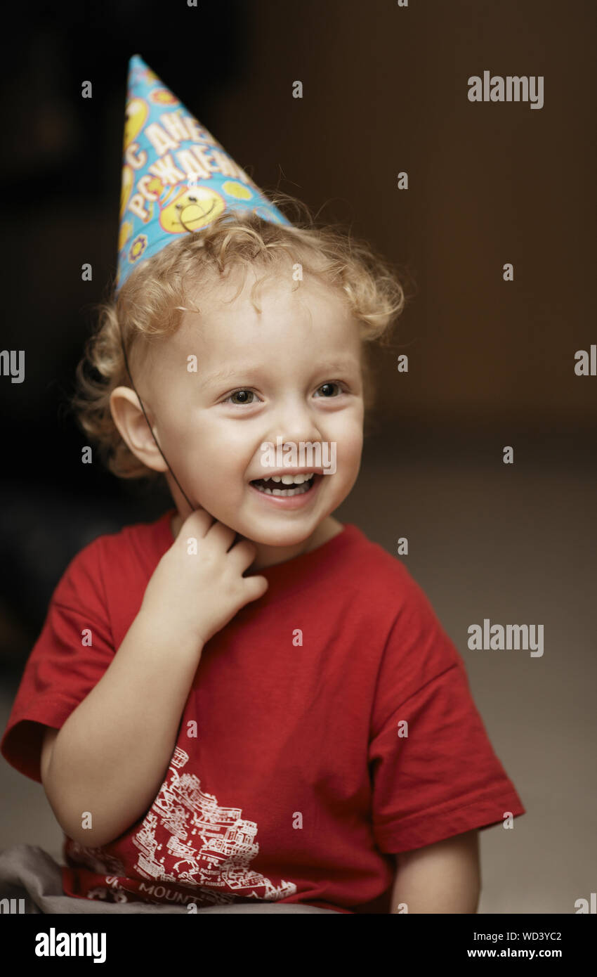 Boy wearing party hat hi-res stock photography and images - Alamy