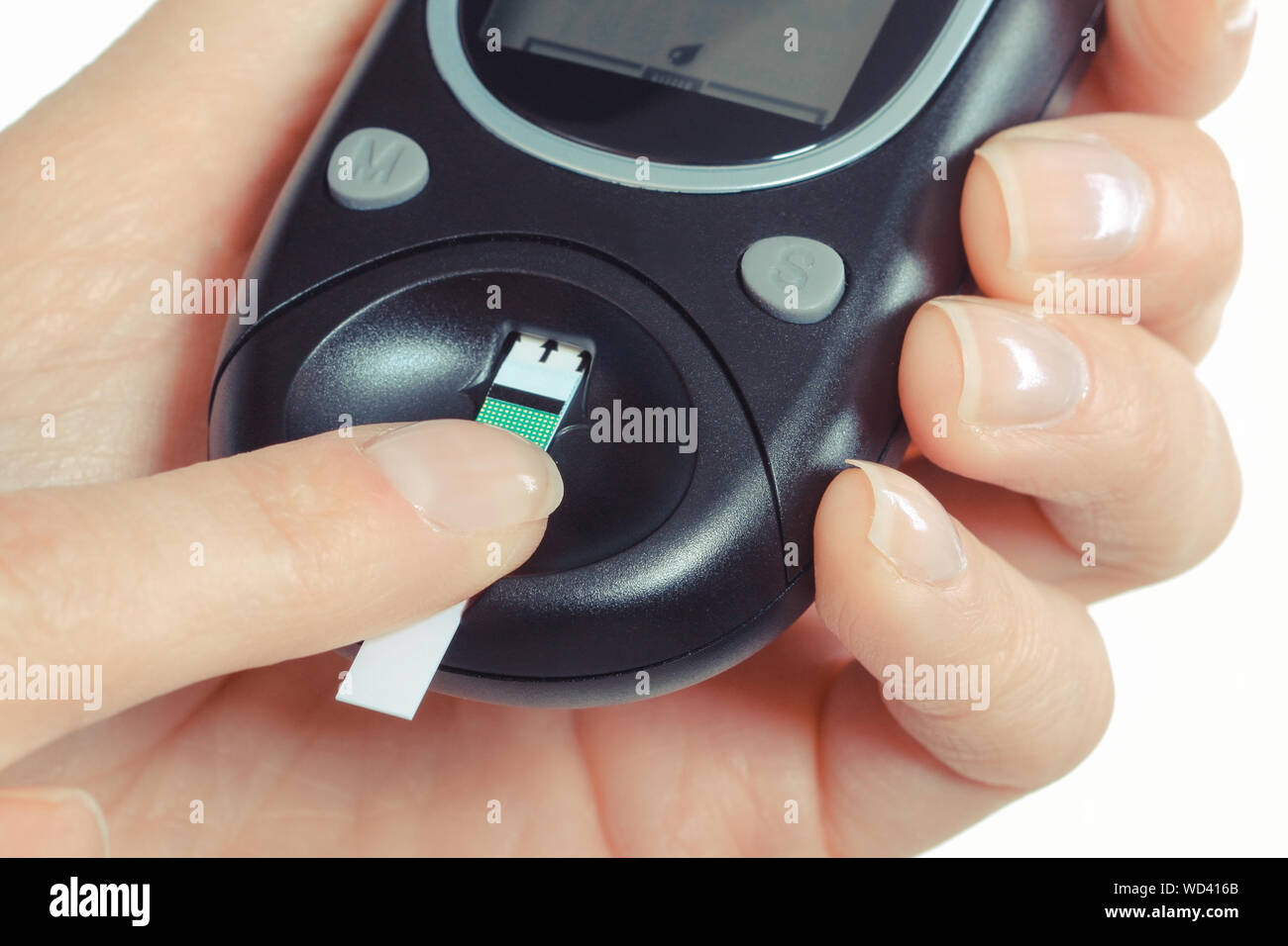 Finger with glucometer. Diabetes, checking and measuring sugar level ...