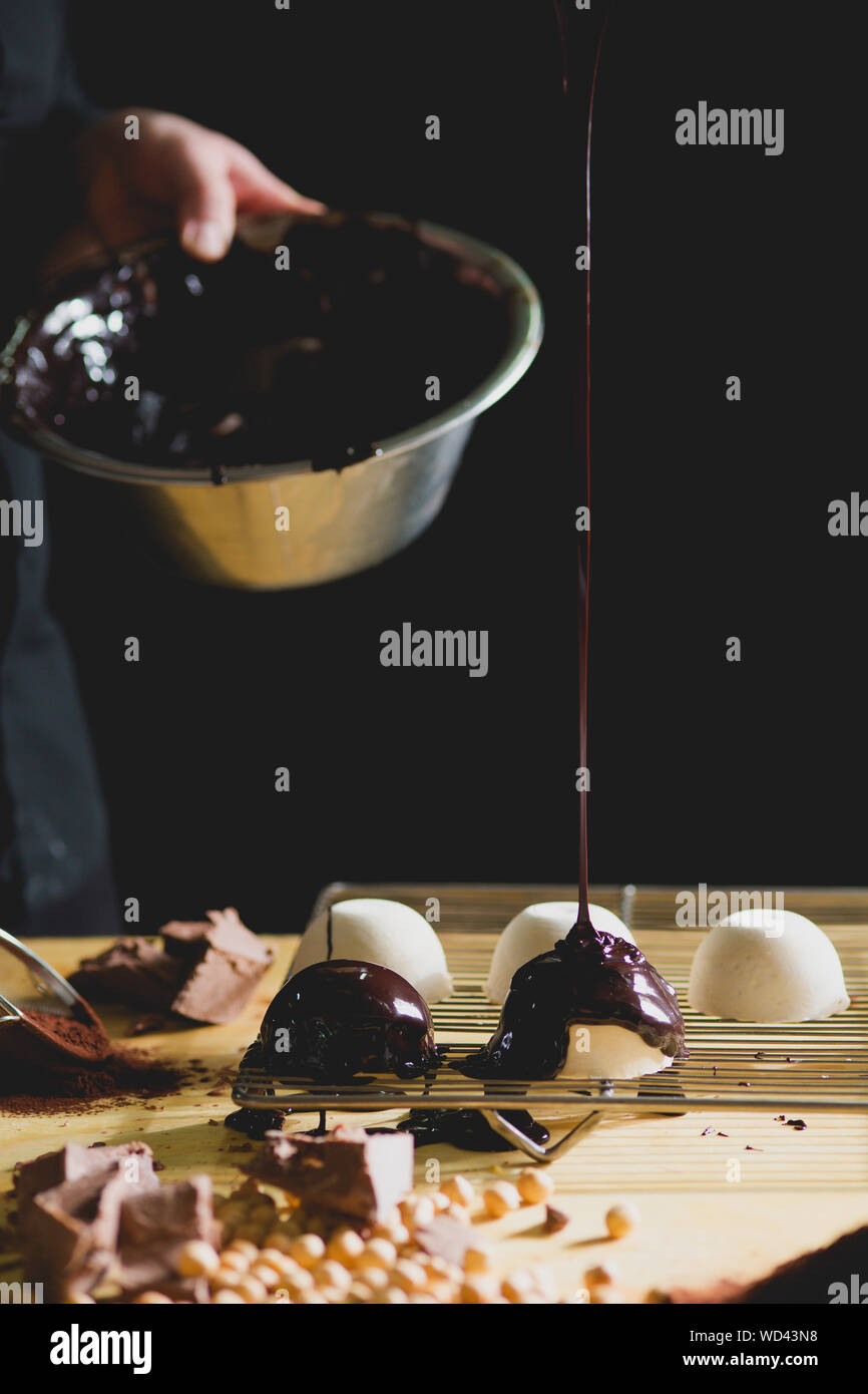 Close up dripping liquid chocolate hi-res stock photography and images ...