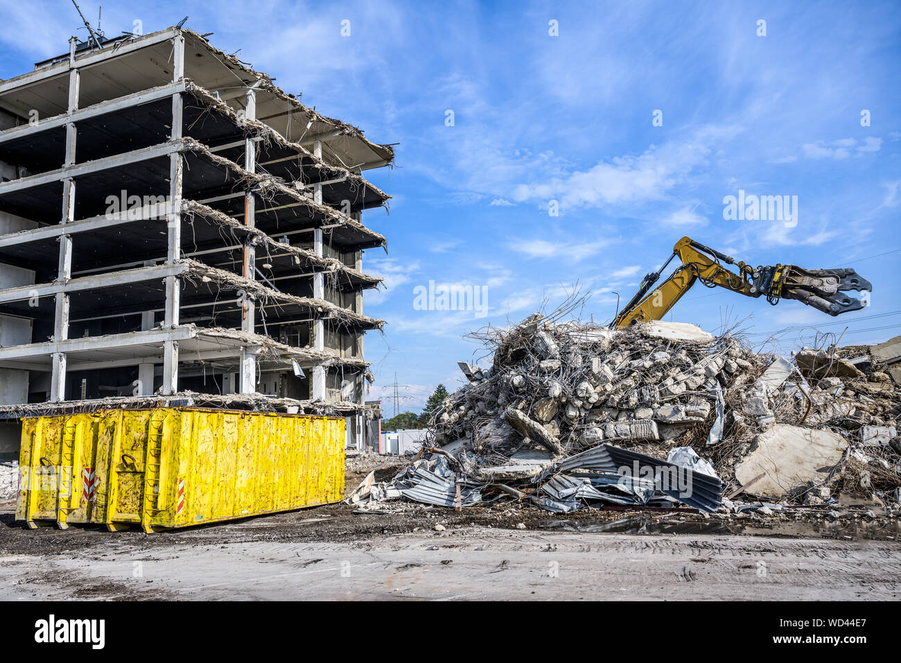 Building House Demolition site Excavator with hydraulic crasher machine ...