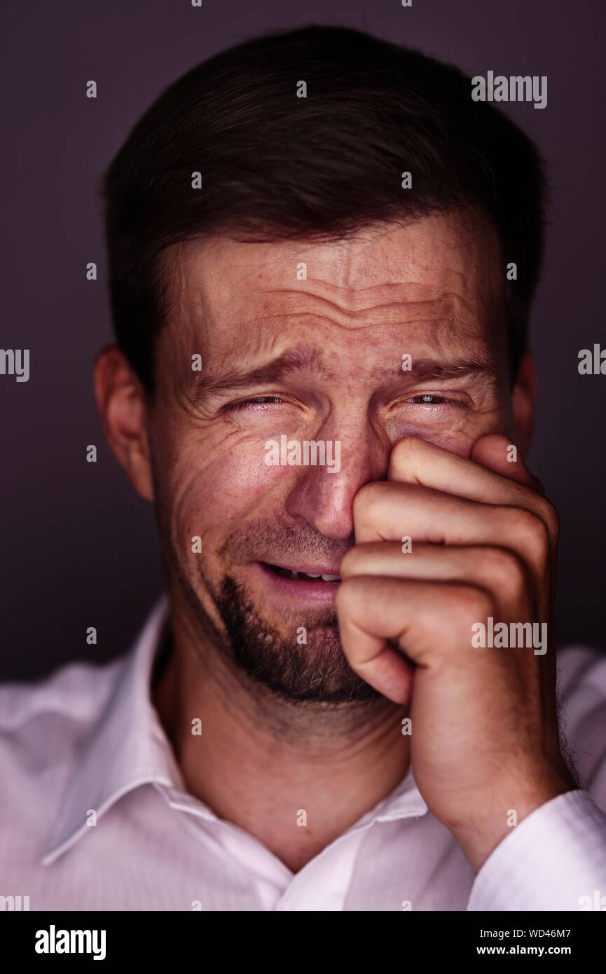 Crying black man hi-res stock photography and images - Alamy