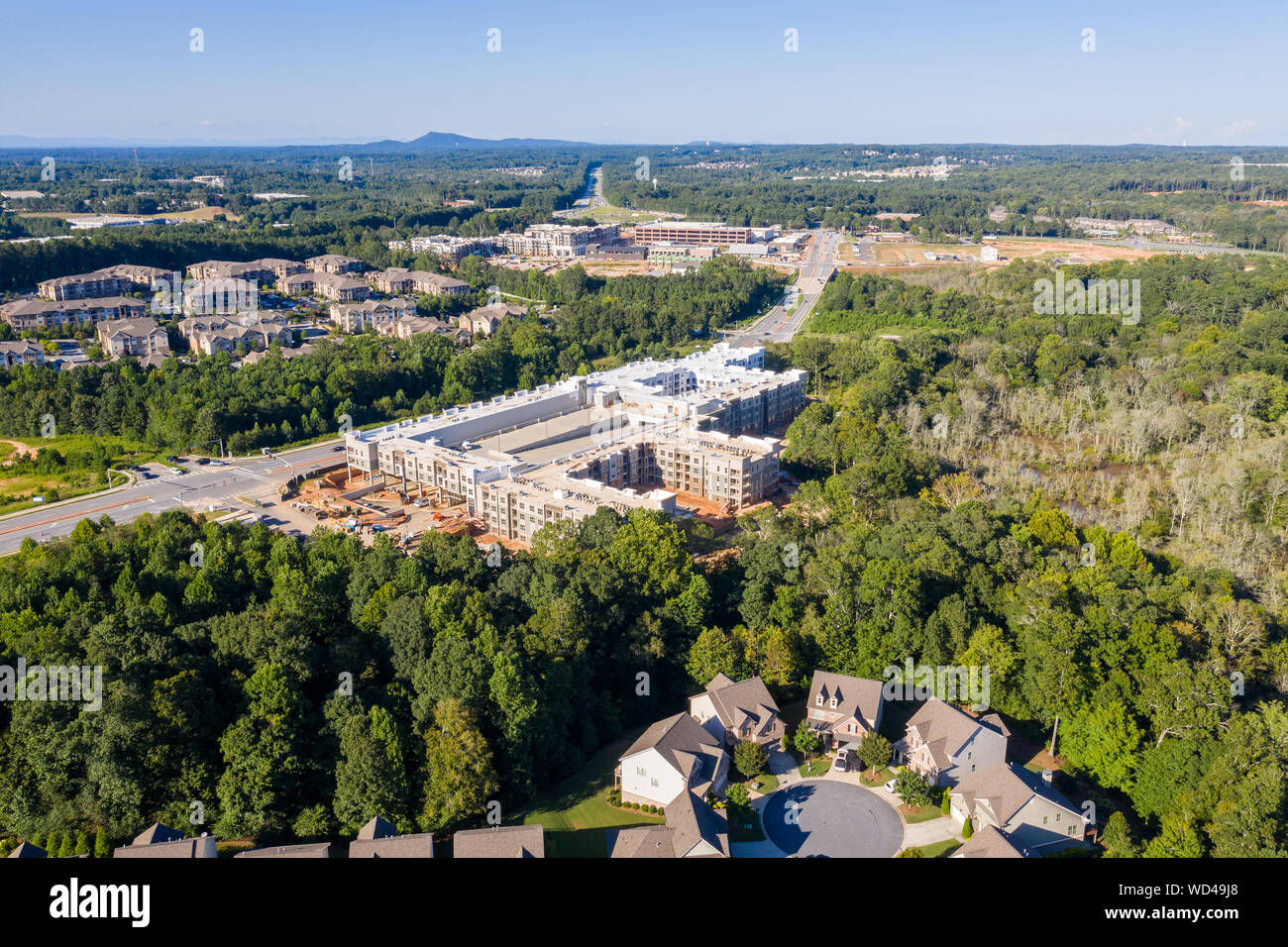 Aerial view new Mall construction in Atlanta suburbs next to highway ...