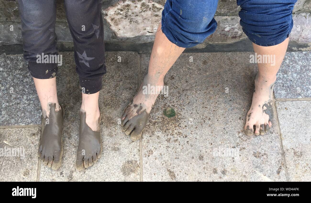 Muddy feet hi-res stock photography and images - Alamy