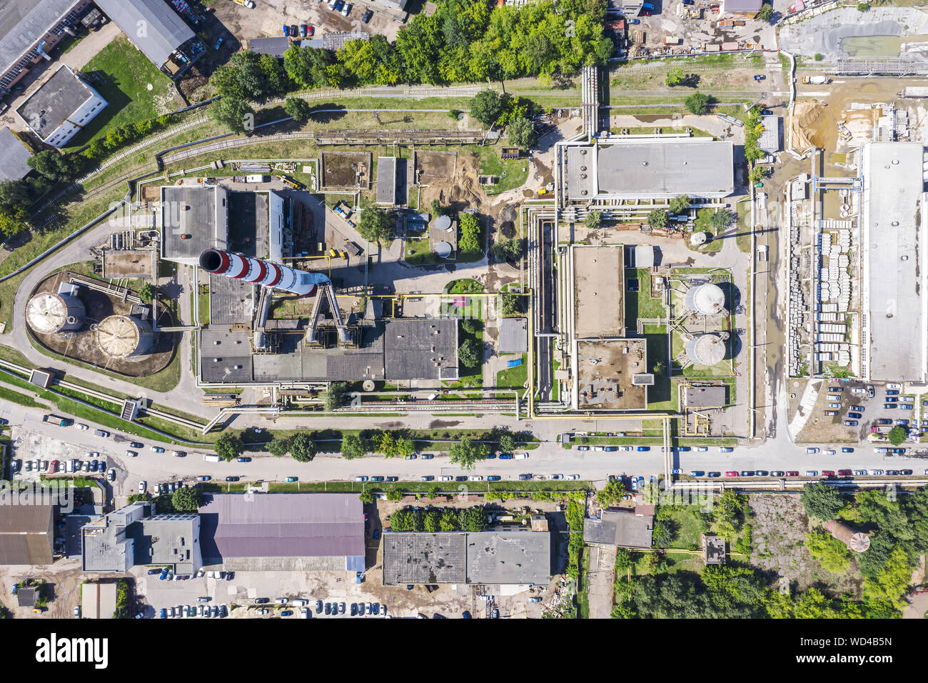 birds eye view on industrial area with power plant building and ...