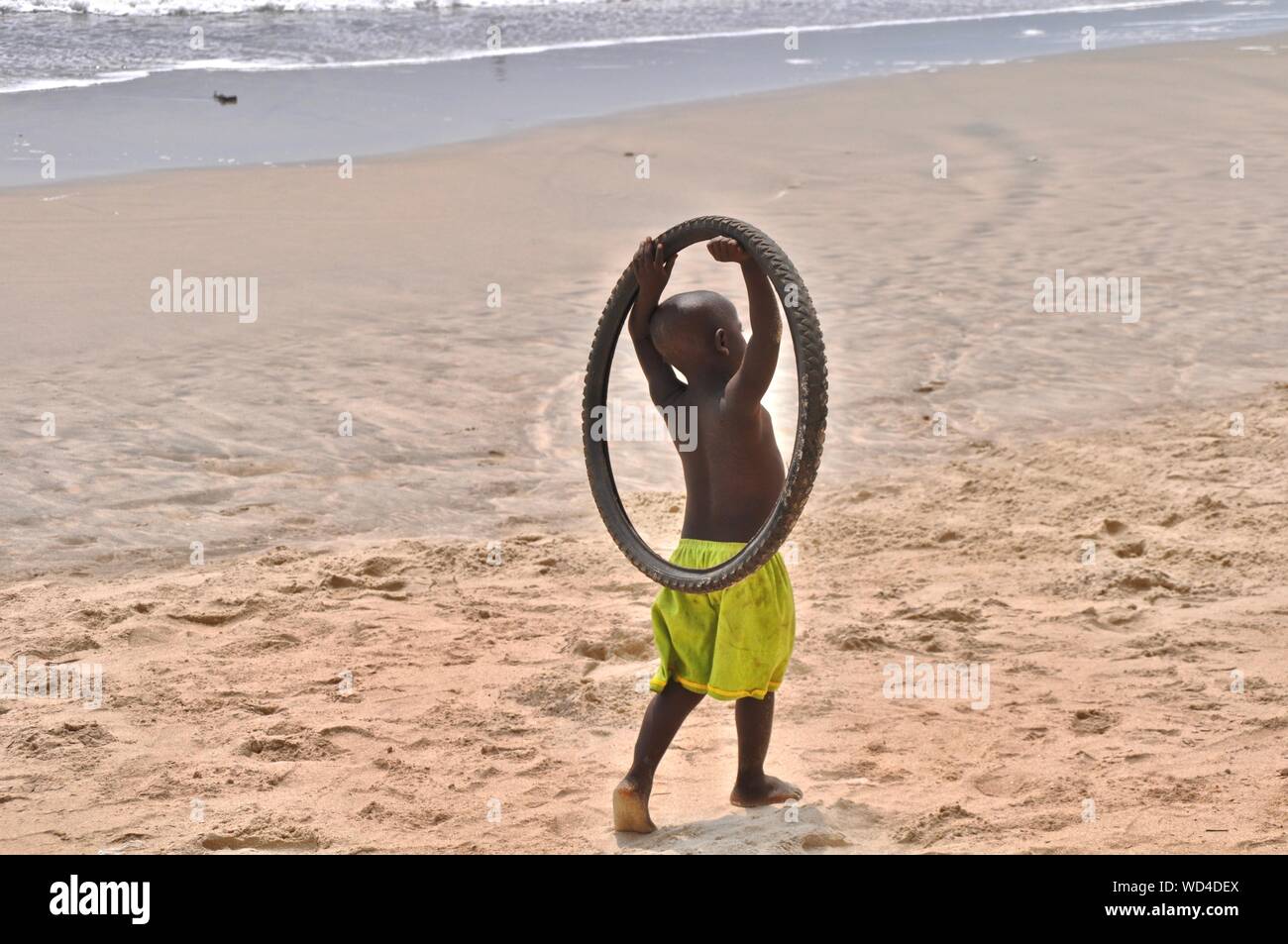 Boy playing wheel hi-res stock photography and images - Alamy
