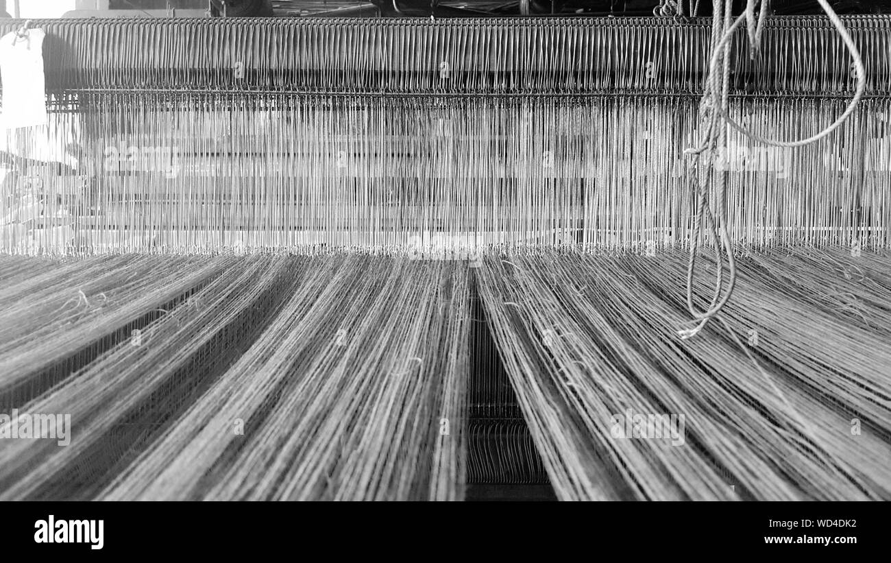 Weaving with silk threads hi-res stock photography and images - Alamy