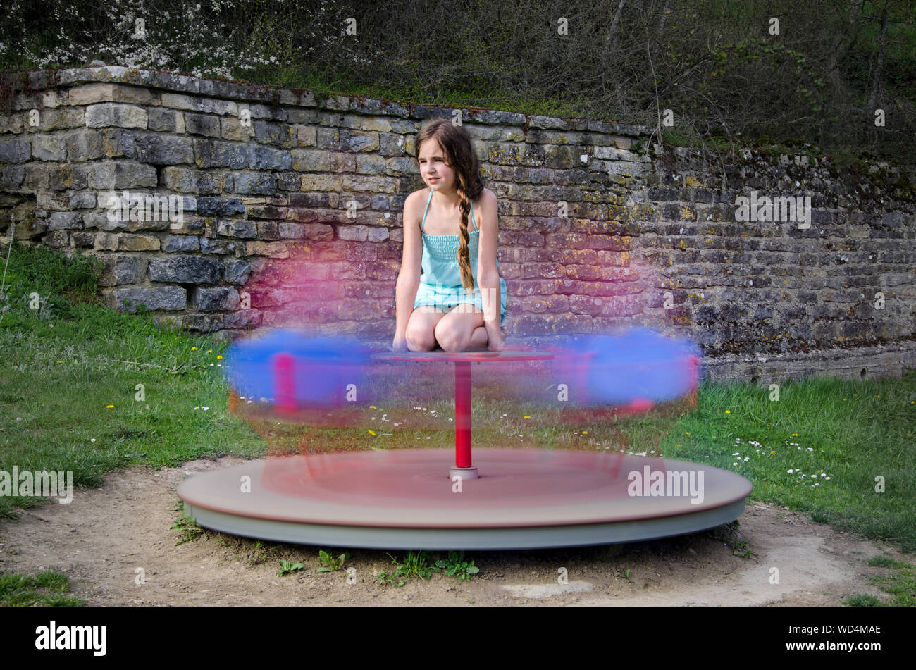 Child merry go round hi-res stock photography and images - Alamy