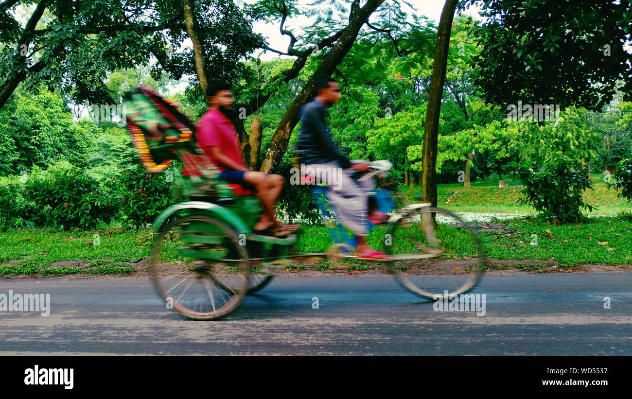 A motion rischa with passenger Stock Photo - Alamy