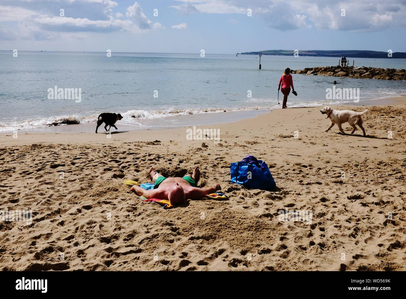 Man lying beach hi-res stock photography and images - Alamy