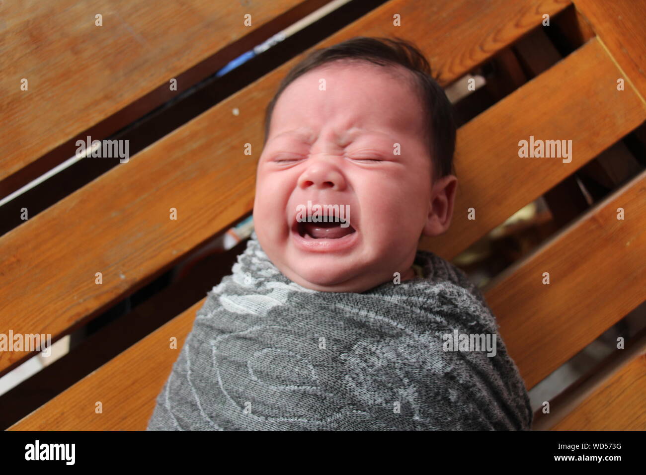 Crying new born baby hi-res stock photography and images - Alamy