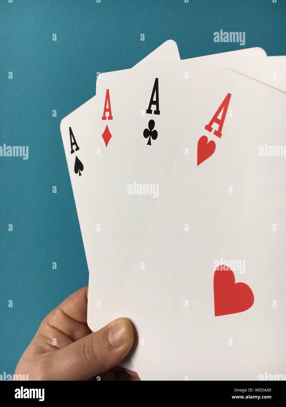 Winning hand of cards hi-res stock photography and images - Alamy