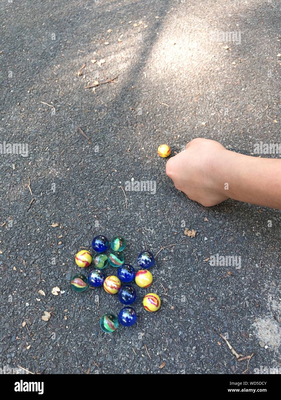 Boy Playing Marbles High Resolution Stock Photography and Images - Alamy