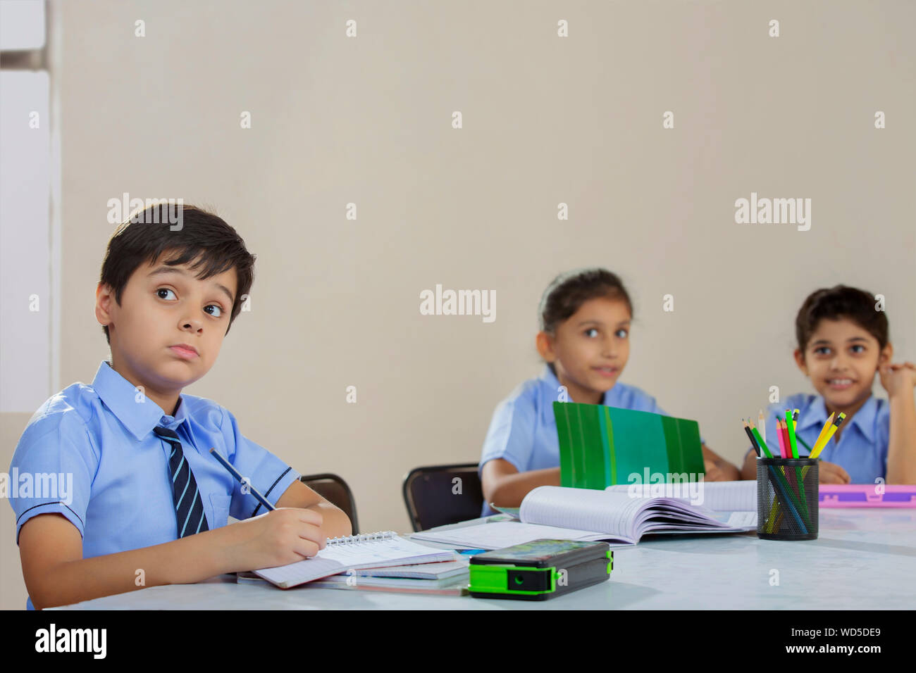 children studying in classroom Stock Photo - Alamy