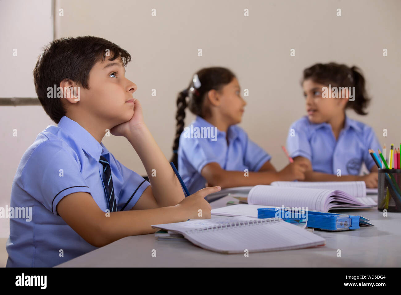 students completing their work in free period Stock Photo - Alamy