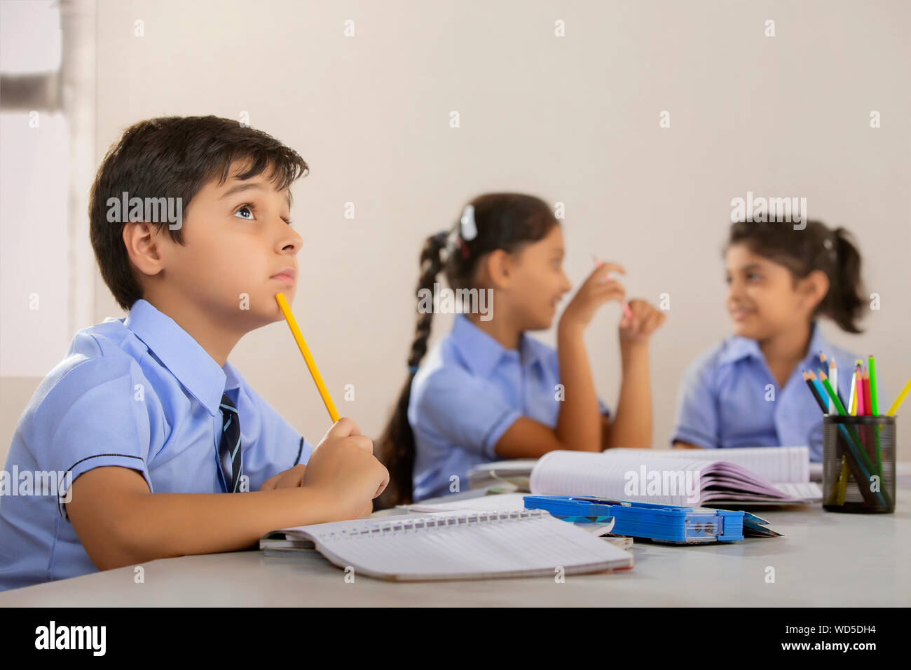 students sitting in their classroom and studying Stock Photo - Alamy