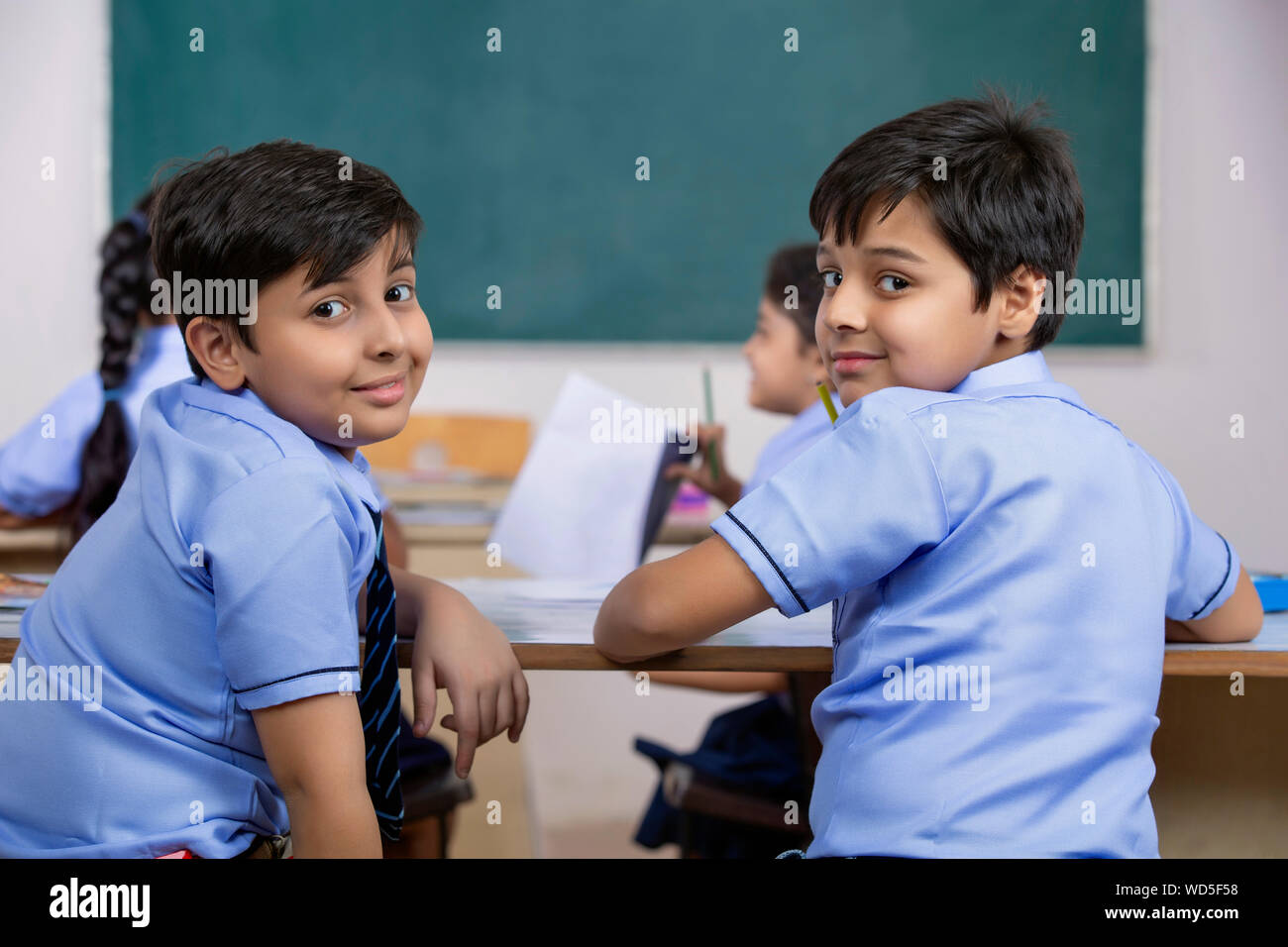 Two boys in class hi-res stock photography and images - Alamy