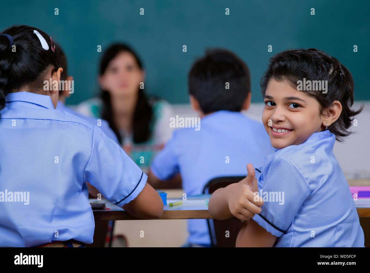 School girl back view uniform hi-res stock photography and images - Alamy