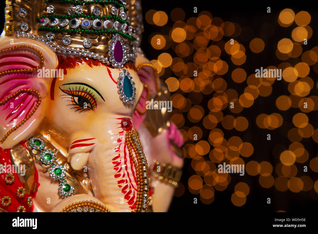 side shot of lord ganesha idol Stock Photo - Alamy