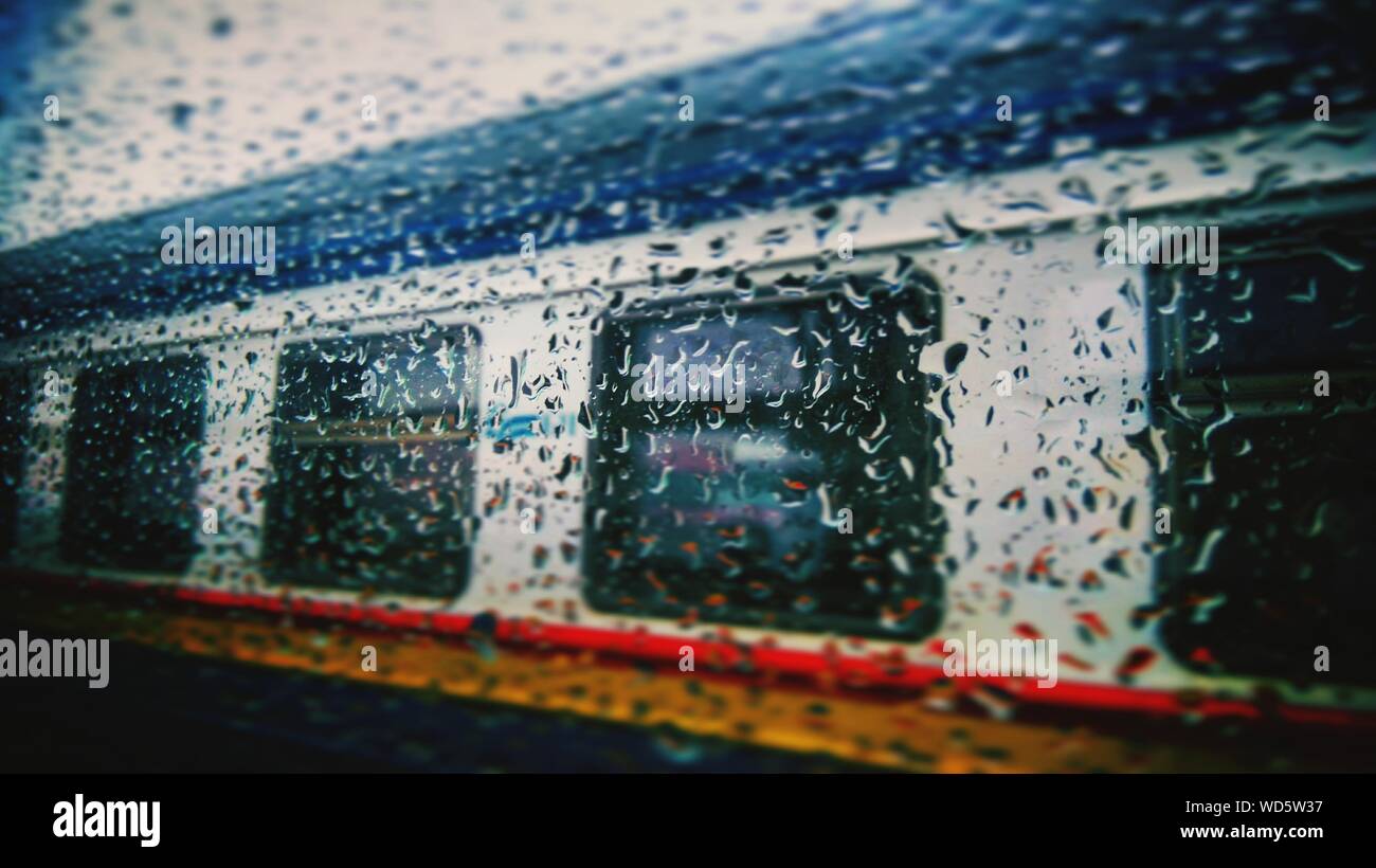 Rain drops on train window hi-res stock photography and images - Alamy