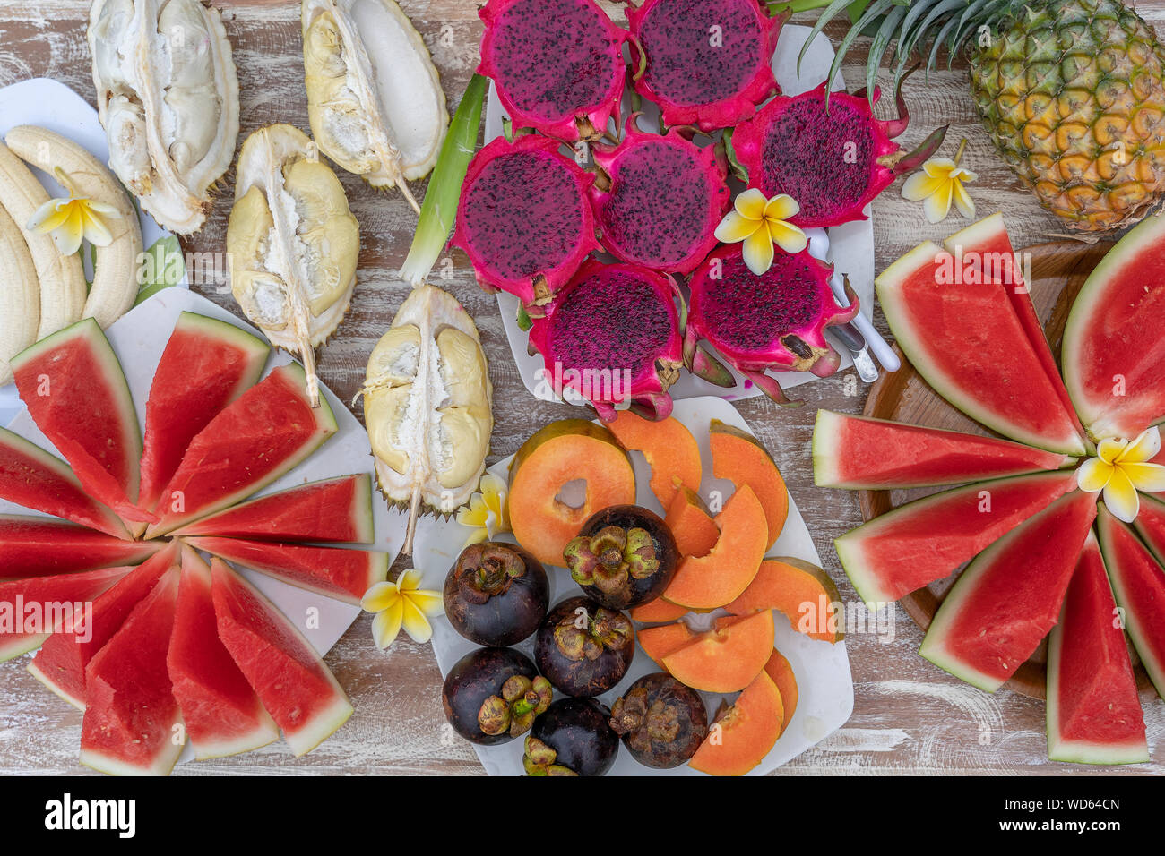 Tropical fruits assortment, close up, top view. Many colorful ripe ...