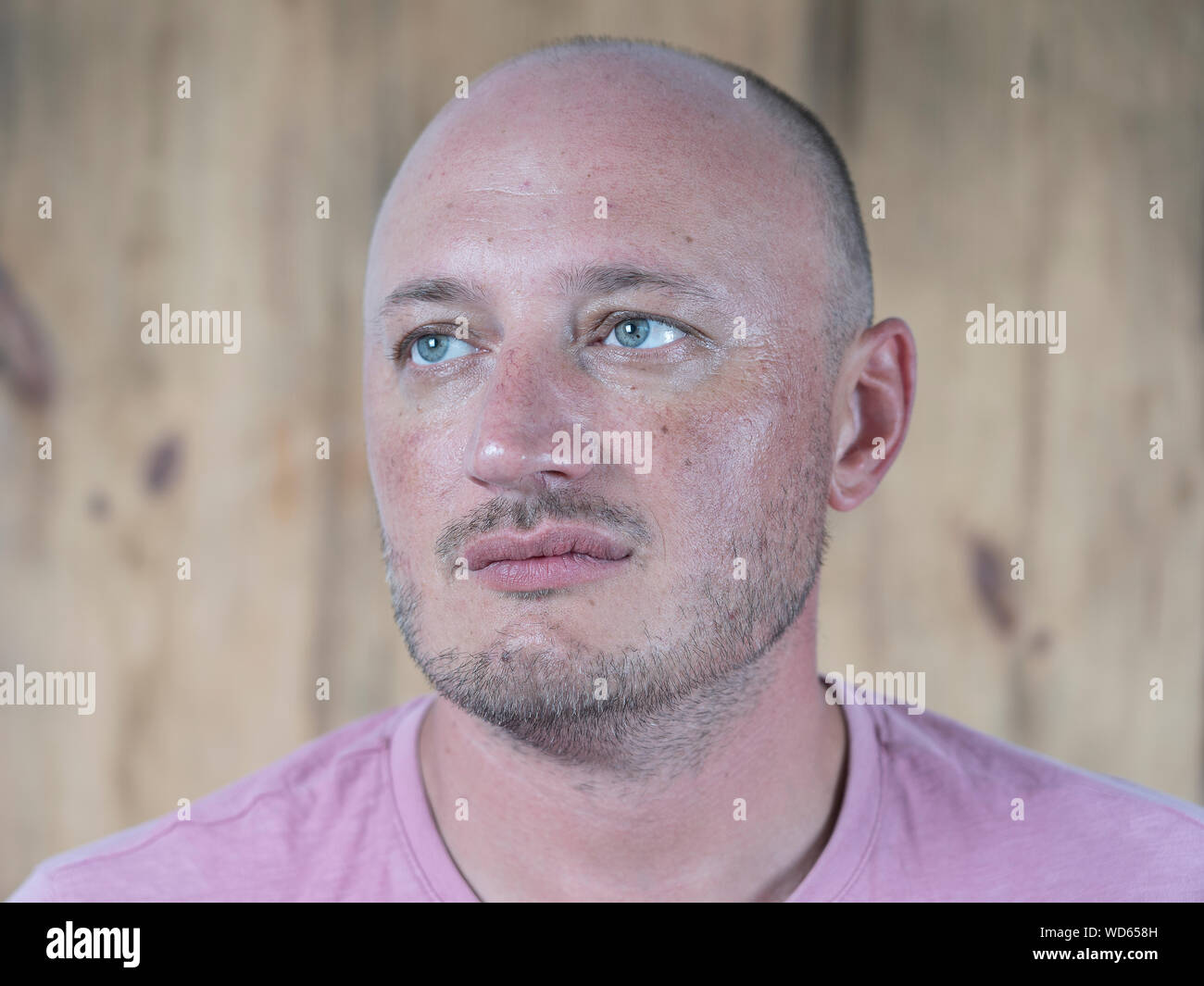 Man bald shaved head expression hi-res stock photography and images - Alamy