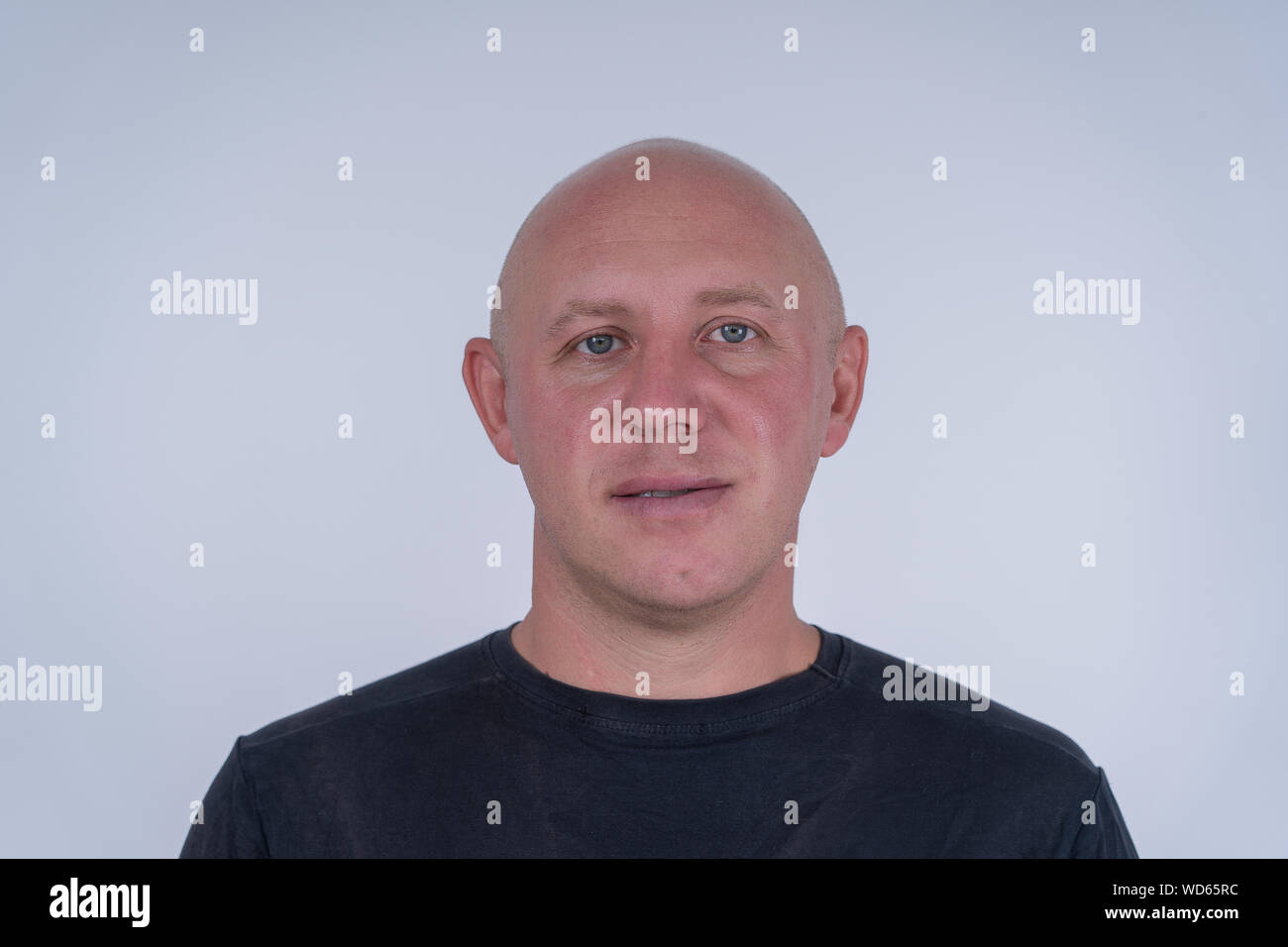 Man bald shaved head expression hi-res stock photography and images - Alamy