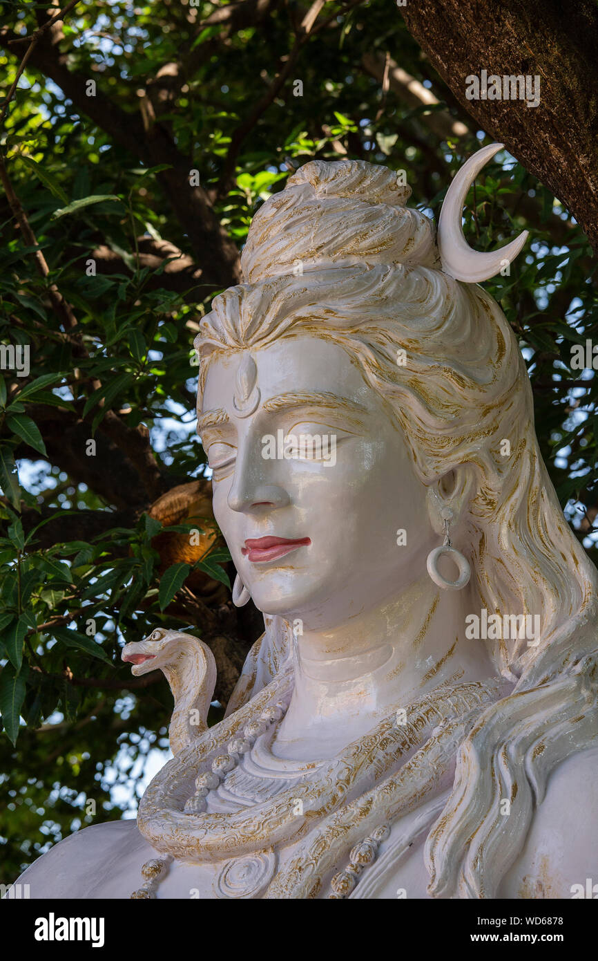 Sculpture of the Indian god Shiva, Hindu idol near Ganges river ...