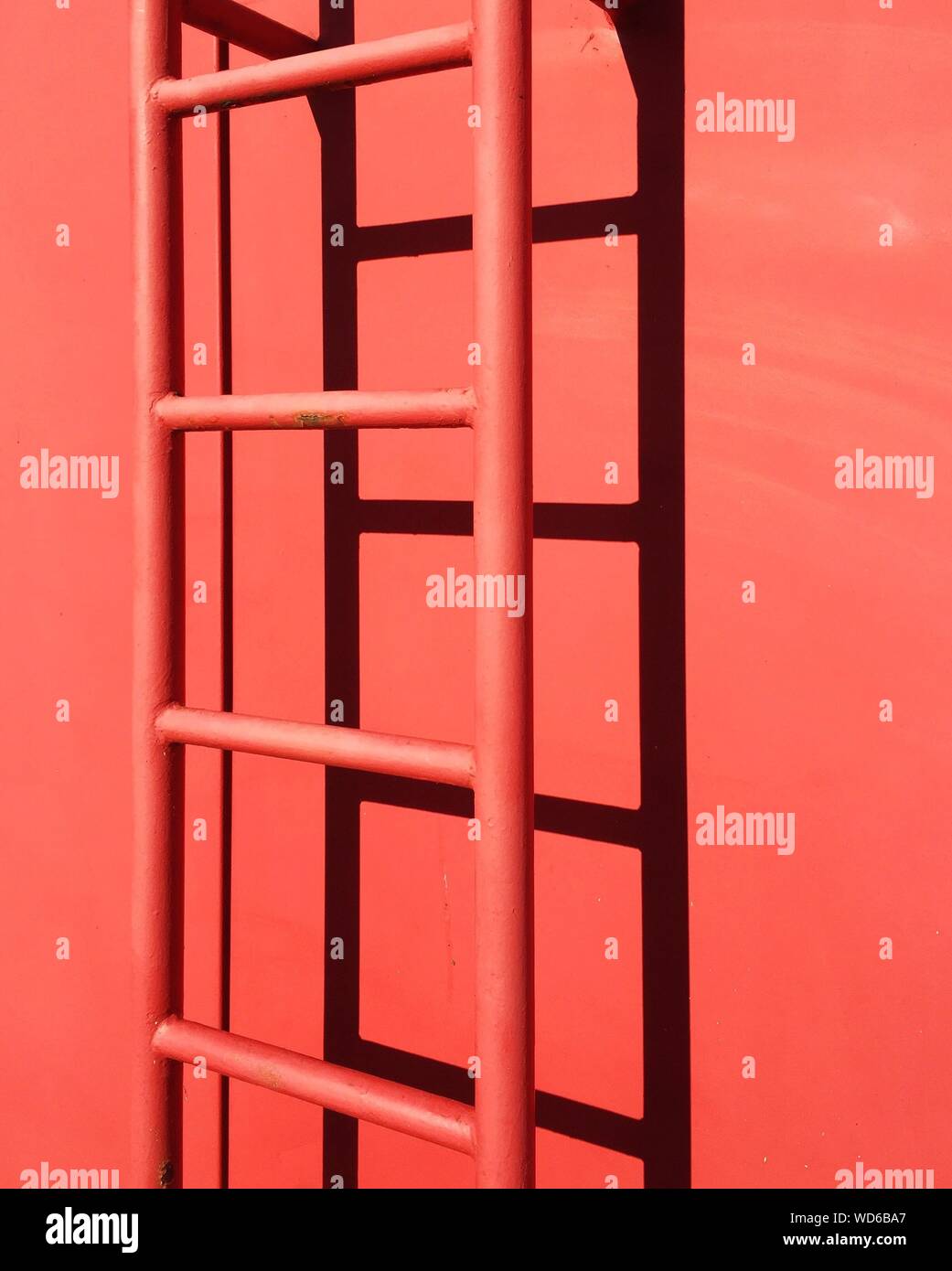 Red wall ladder hi-res stock photography and images - Alamy