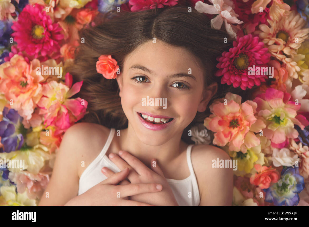 Childhood innocence smiling looking down hi-res stock photography and ...