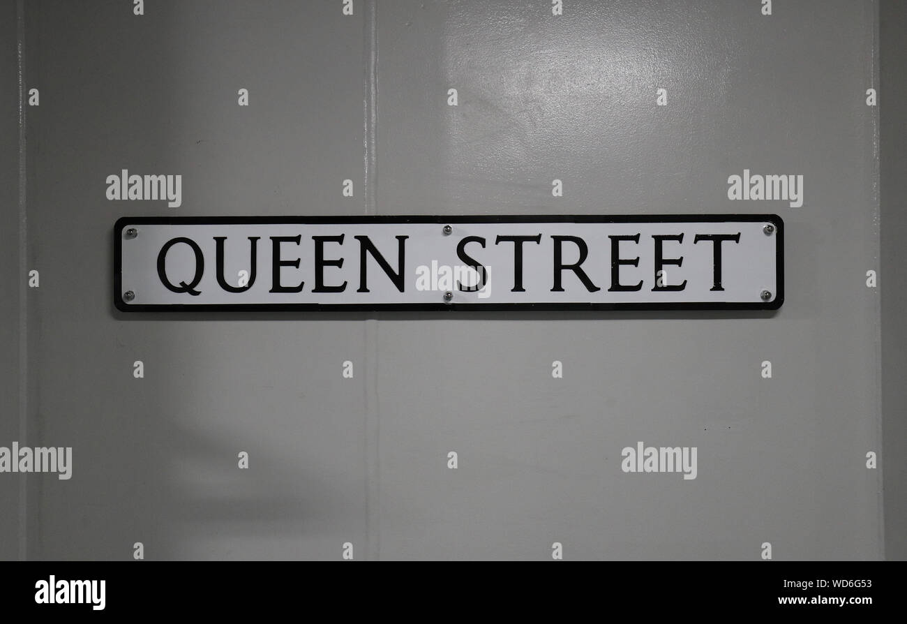 EMBARGOED TO 0001 FRIDAY AUGUST 30 A sign for 'Queen Street' in a ...