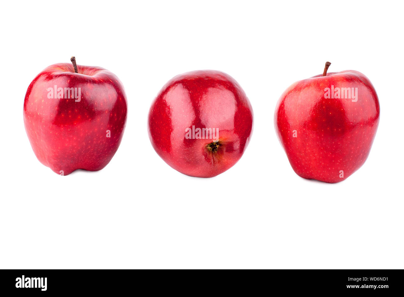 Three red apples on white background isolated close up Stock Photo - Alamy