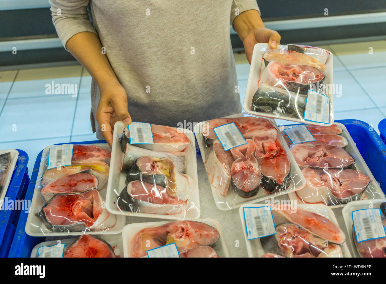 Buying seafood hi-res stock photography and images - Alamy