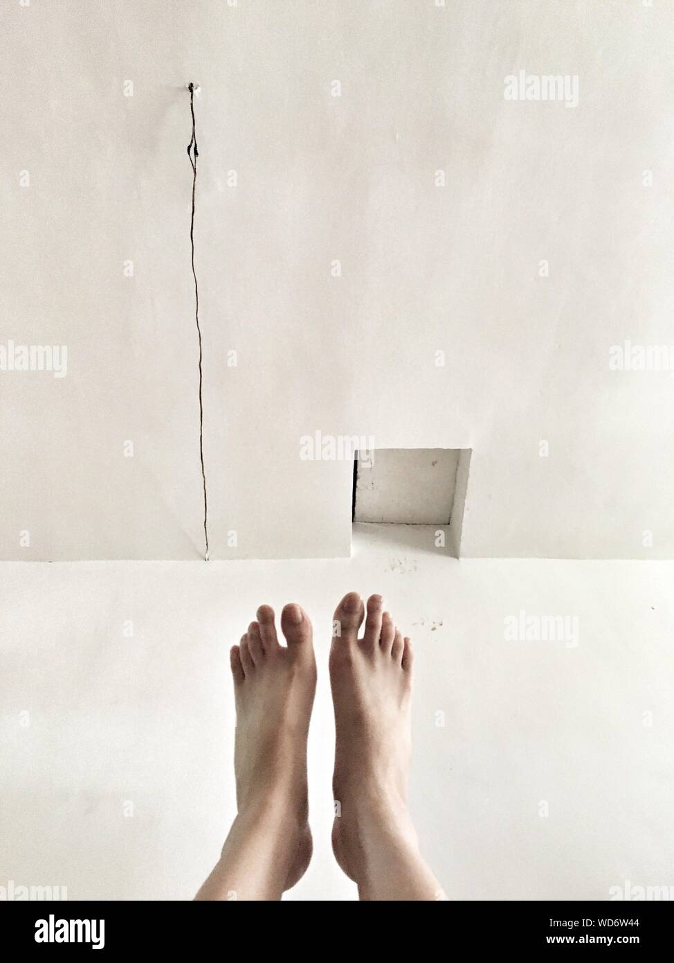 Dangling Foot High Resolution Stock Photography and Images - Alamy